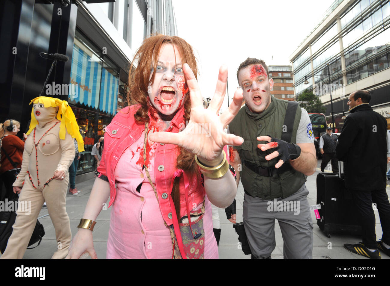 Oxford Street, London, UK. 12th October 2013. Zombies walk through ...