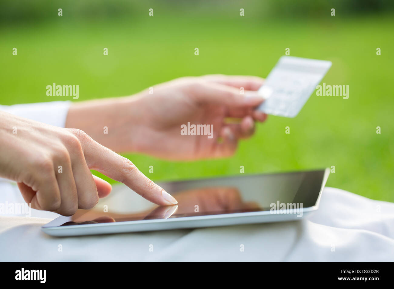 Female outdoor computer finger web plastic card Stock Photo - Alamy