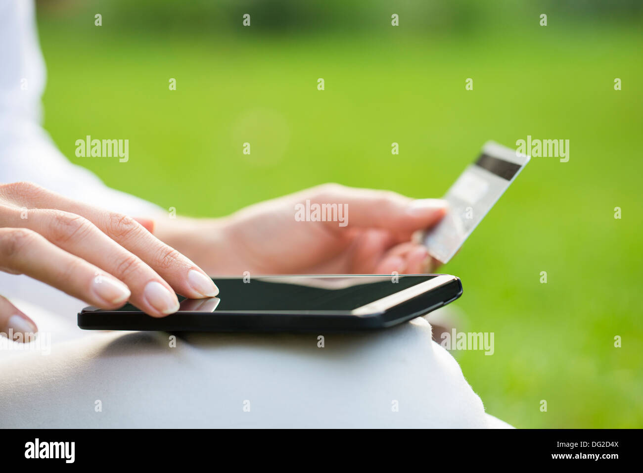 Female outdoor computer finger web plastic card Stock Photo - Alamy