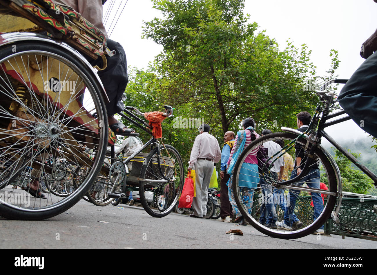 Cycle rickshaws on the street in Nainital Stock Photo - Alamy
