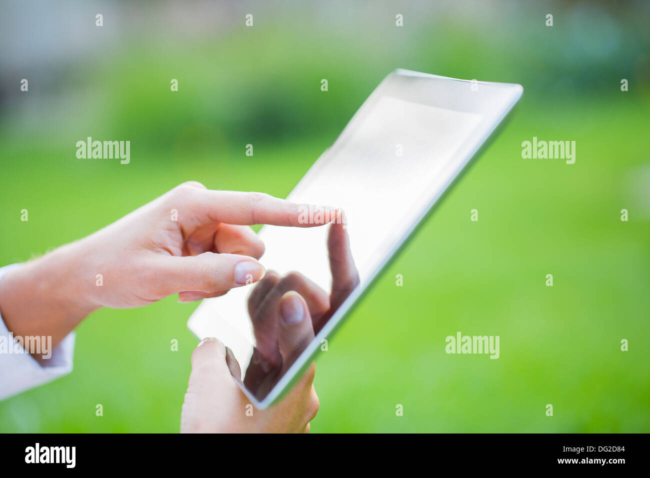 Female green background hi-res stock photography and images - Alamy