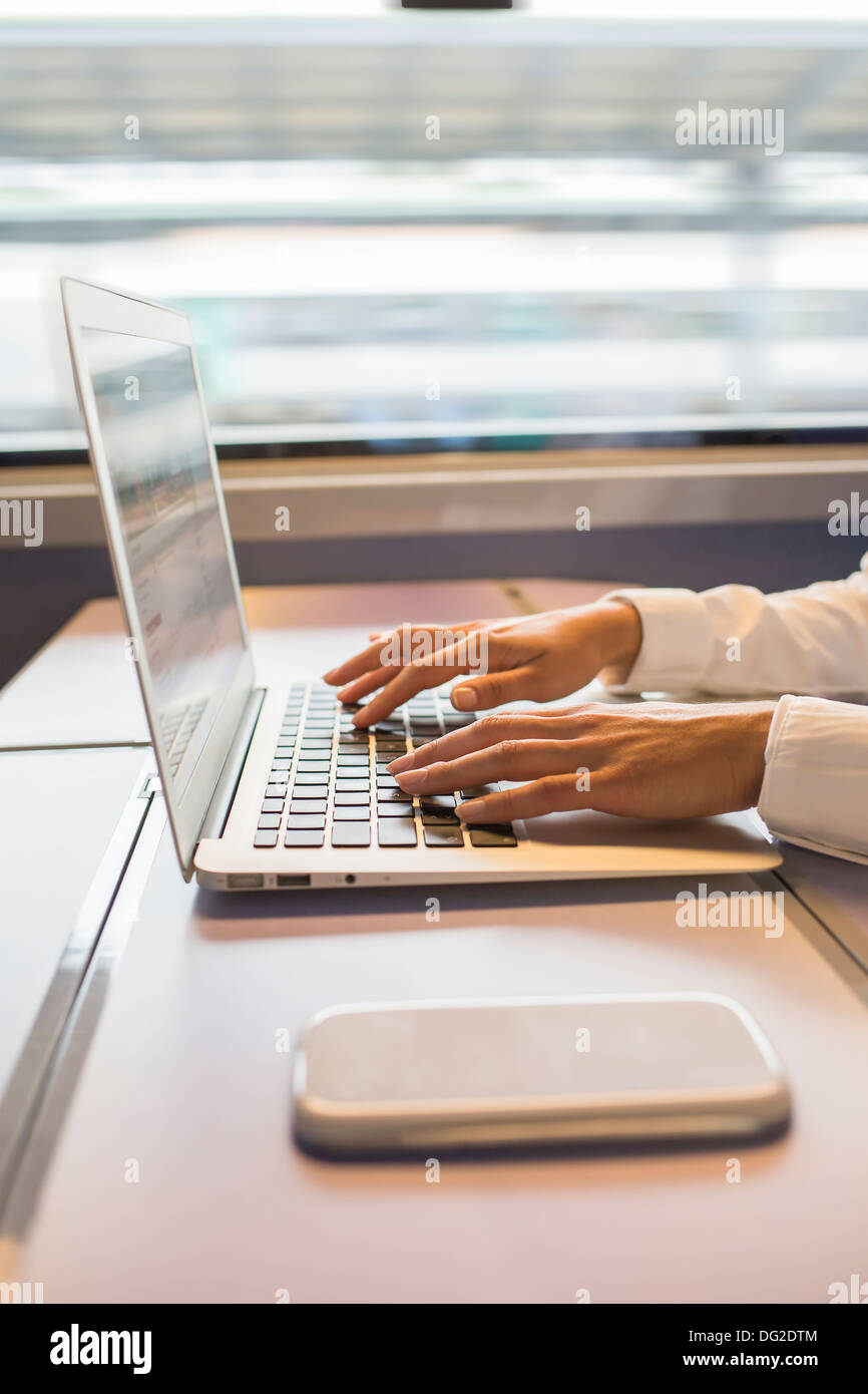 Female finger computer seating wagon Stock Photo - Alamy