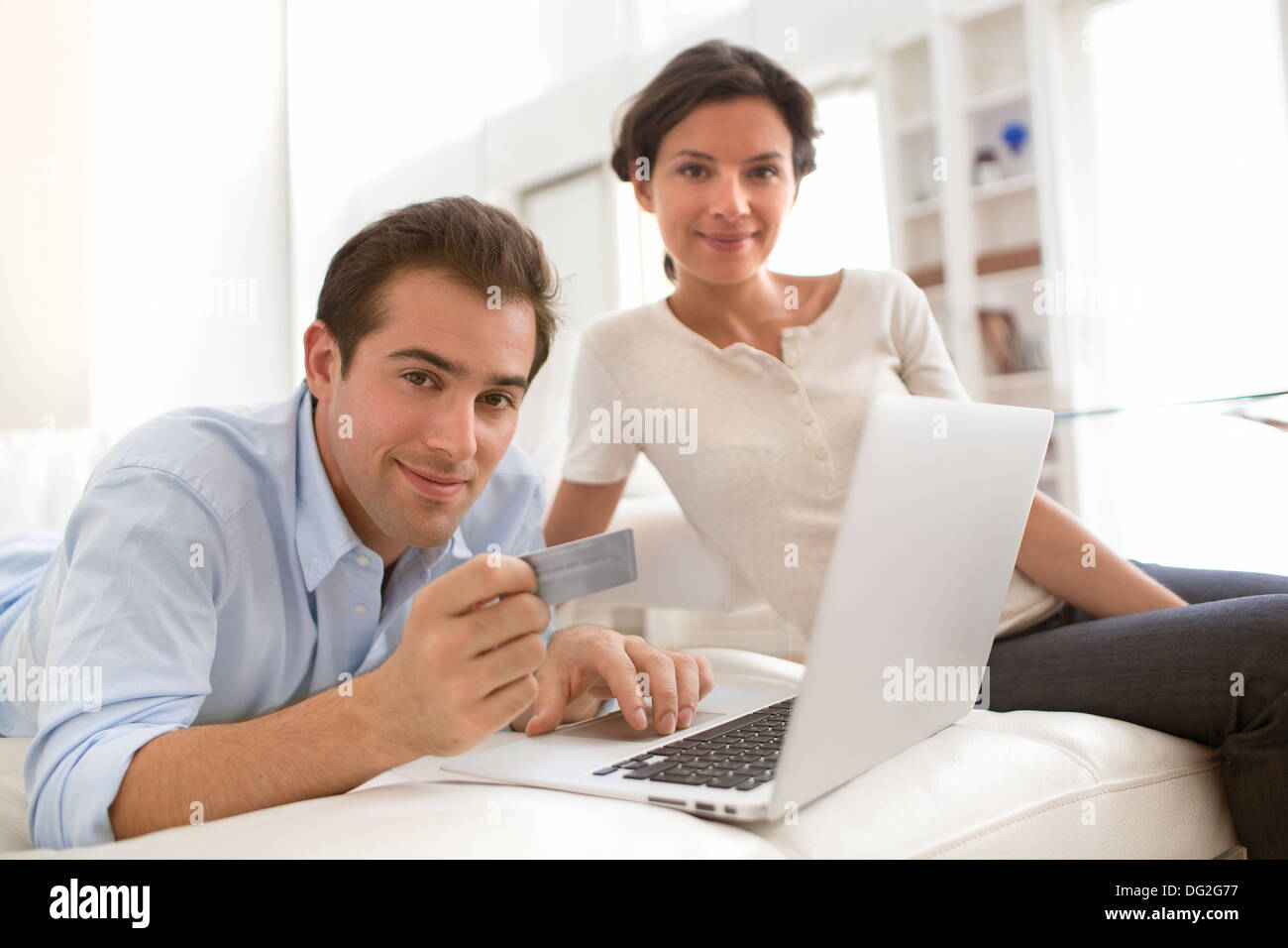 Sofa laptop man woman hi-res stock photography and images - Alamy