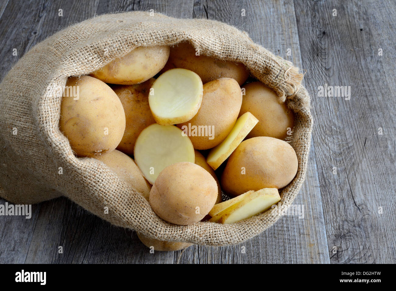 Potato on the wooden table hi-res stock photography and images - Alamy