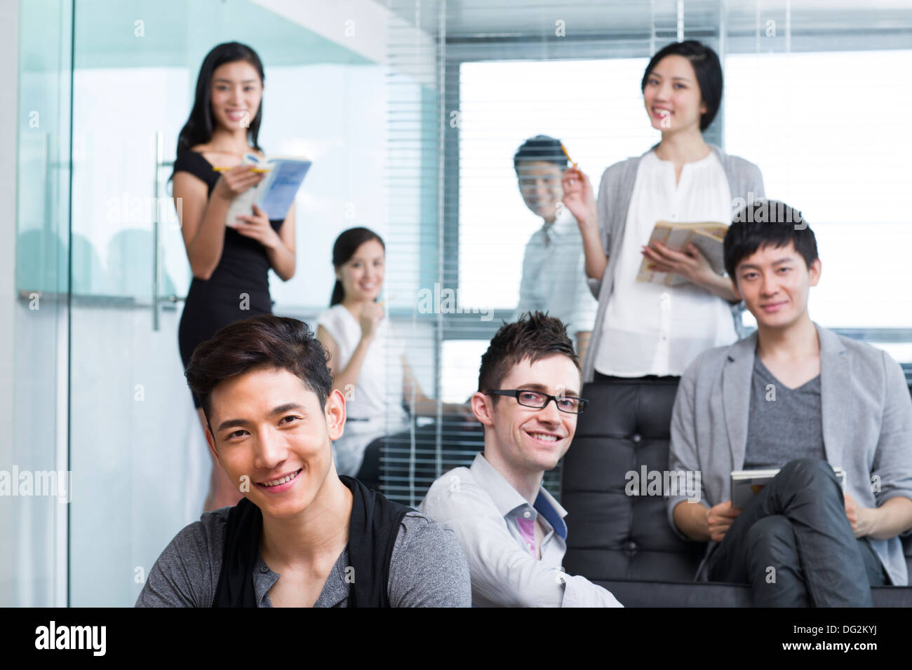 Happy office workers Stock Photo - Alamy