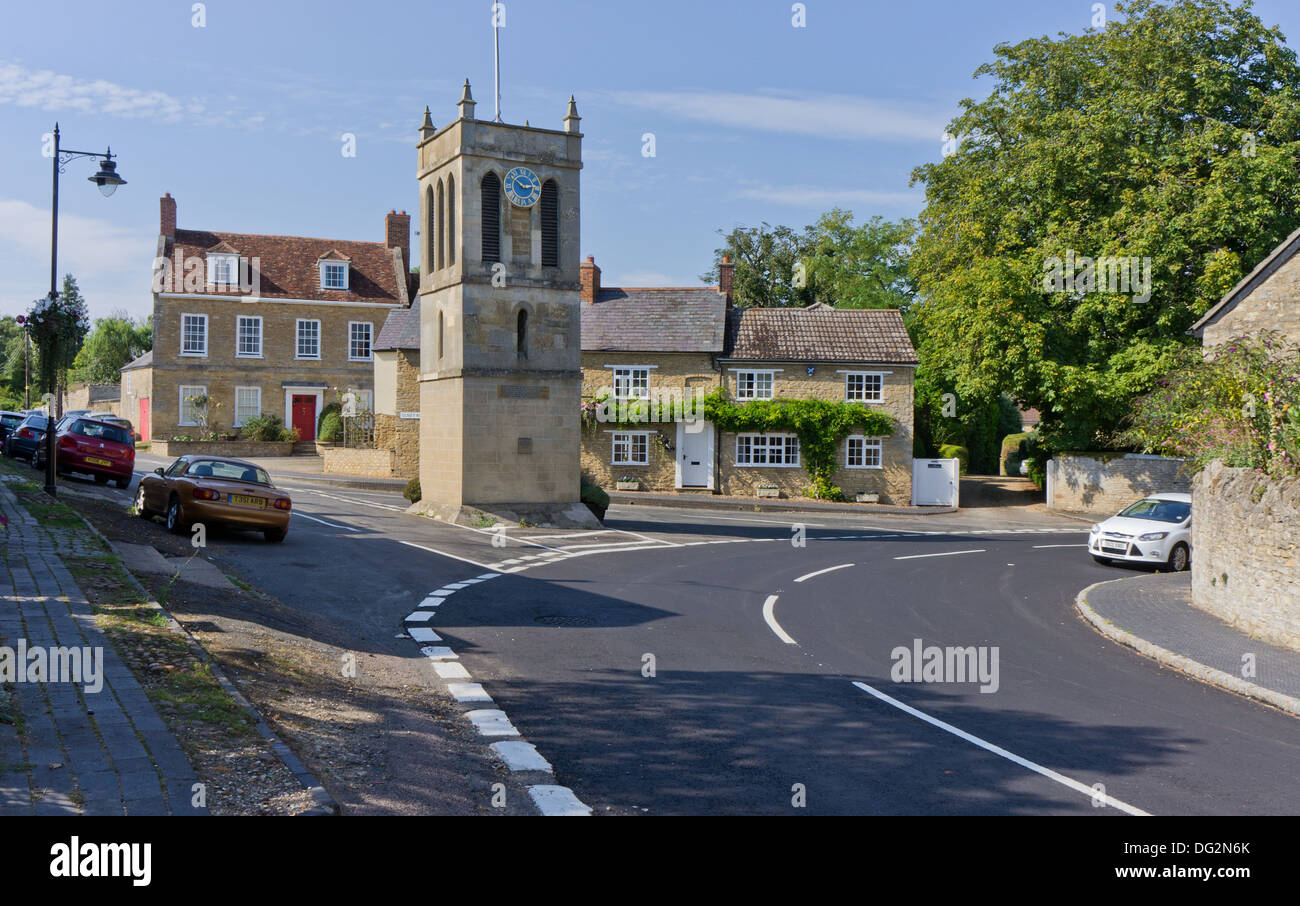 High Street in the village of Emberton, Buckinghamshire, UK: clock ...