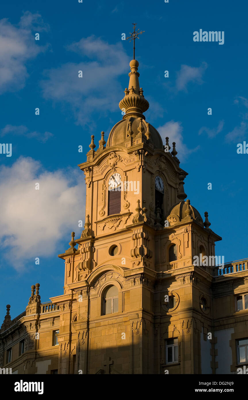 Clock tower of Corazon de Maria Church under a blue sky. in San ...