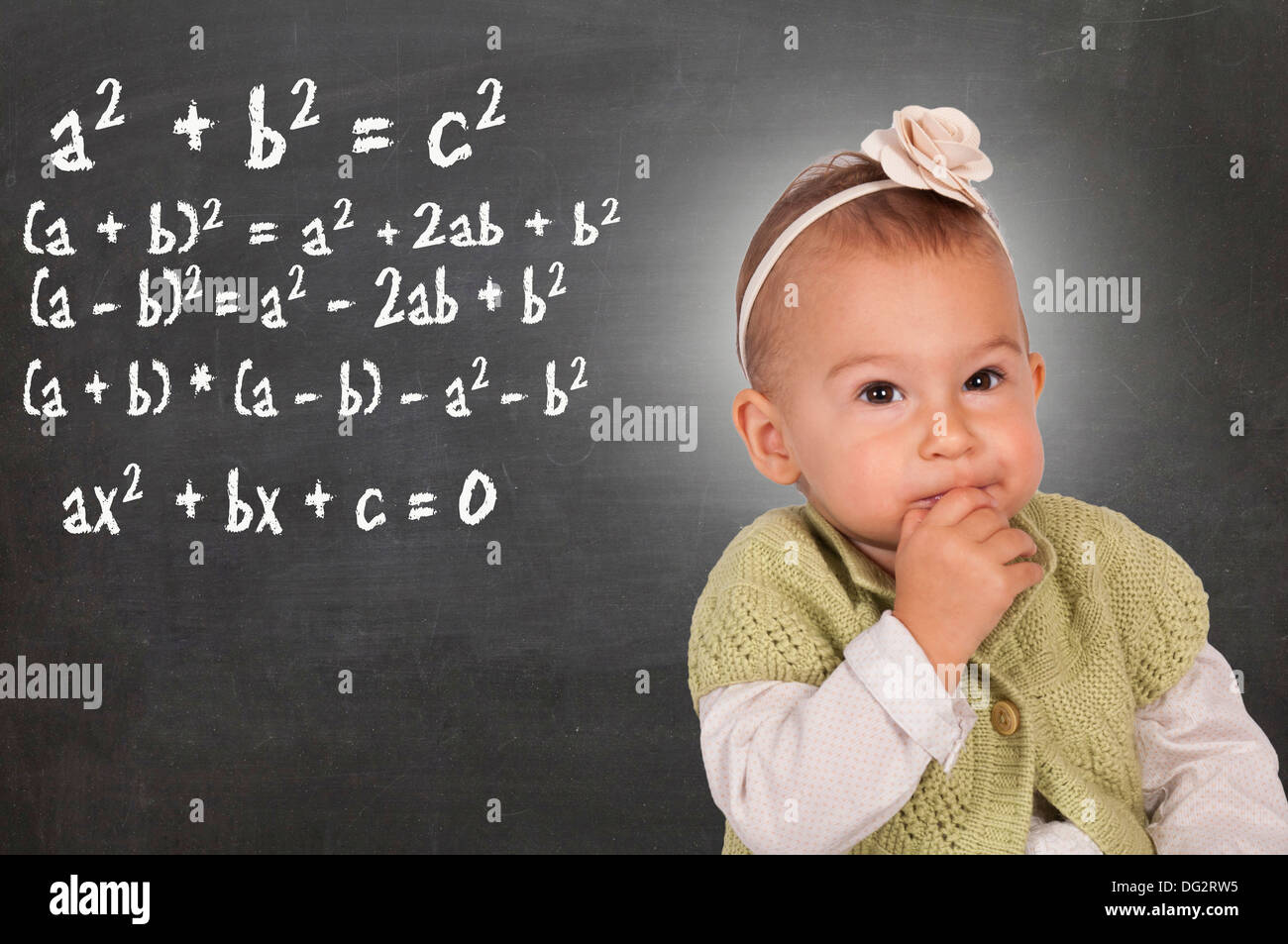 Little baby thinking about mathematic problem Stock Photo - Alamy