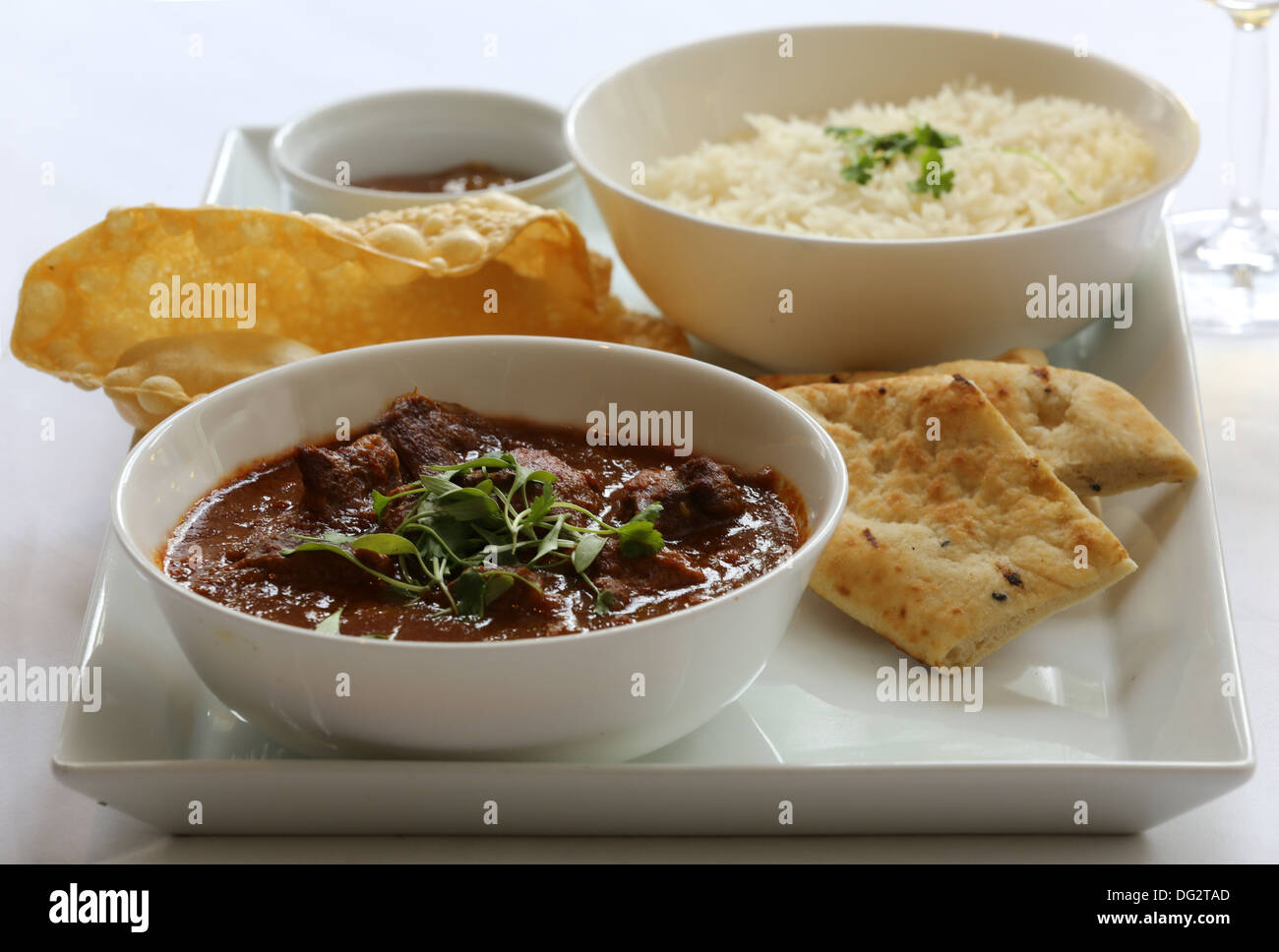 Chicken curry with rice and naan bread Stock Photo - Alamy