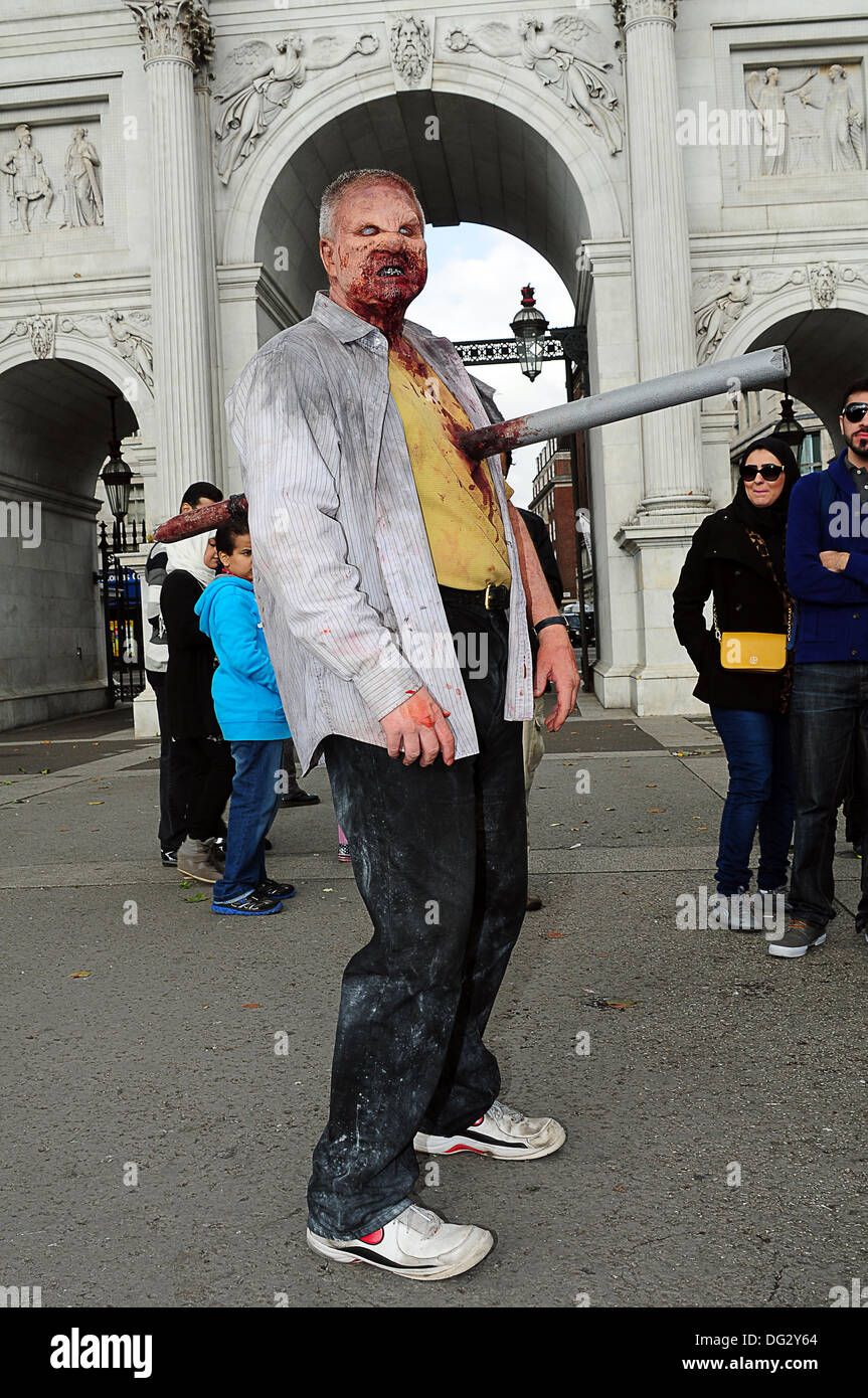 London, UK. 12th Oct 2013. Hundreds of Zombie roaming around centre ...