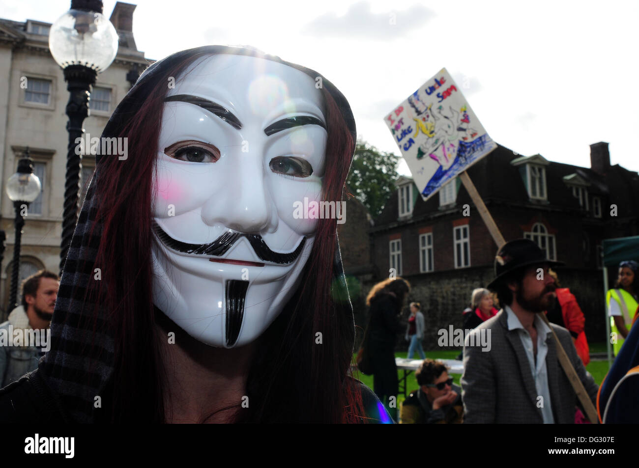 London UK, 12th Oct 2013 : A protesters wearing a anonymous mask join ...