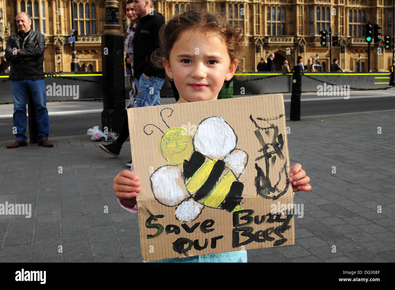 London UK, 12th Oct 2013 : A child protesters holding a placard rally ...