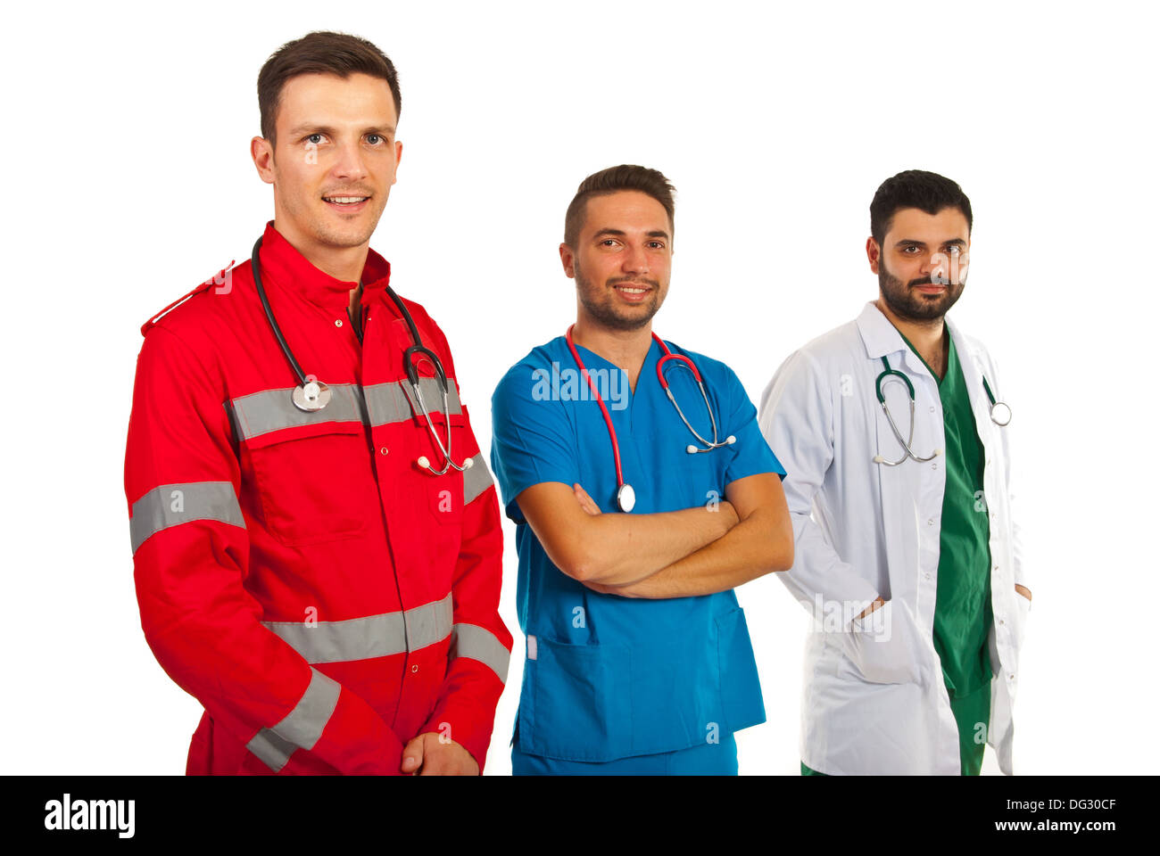 Happy different doctors standing in a row isolated on white background ...