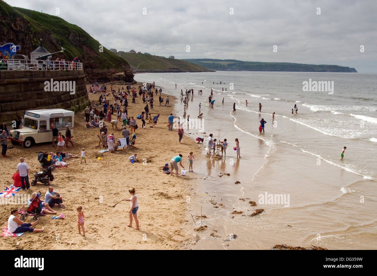 fun on Whitby-beach Stock Photo - Alamy