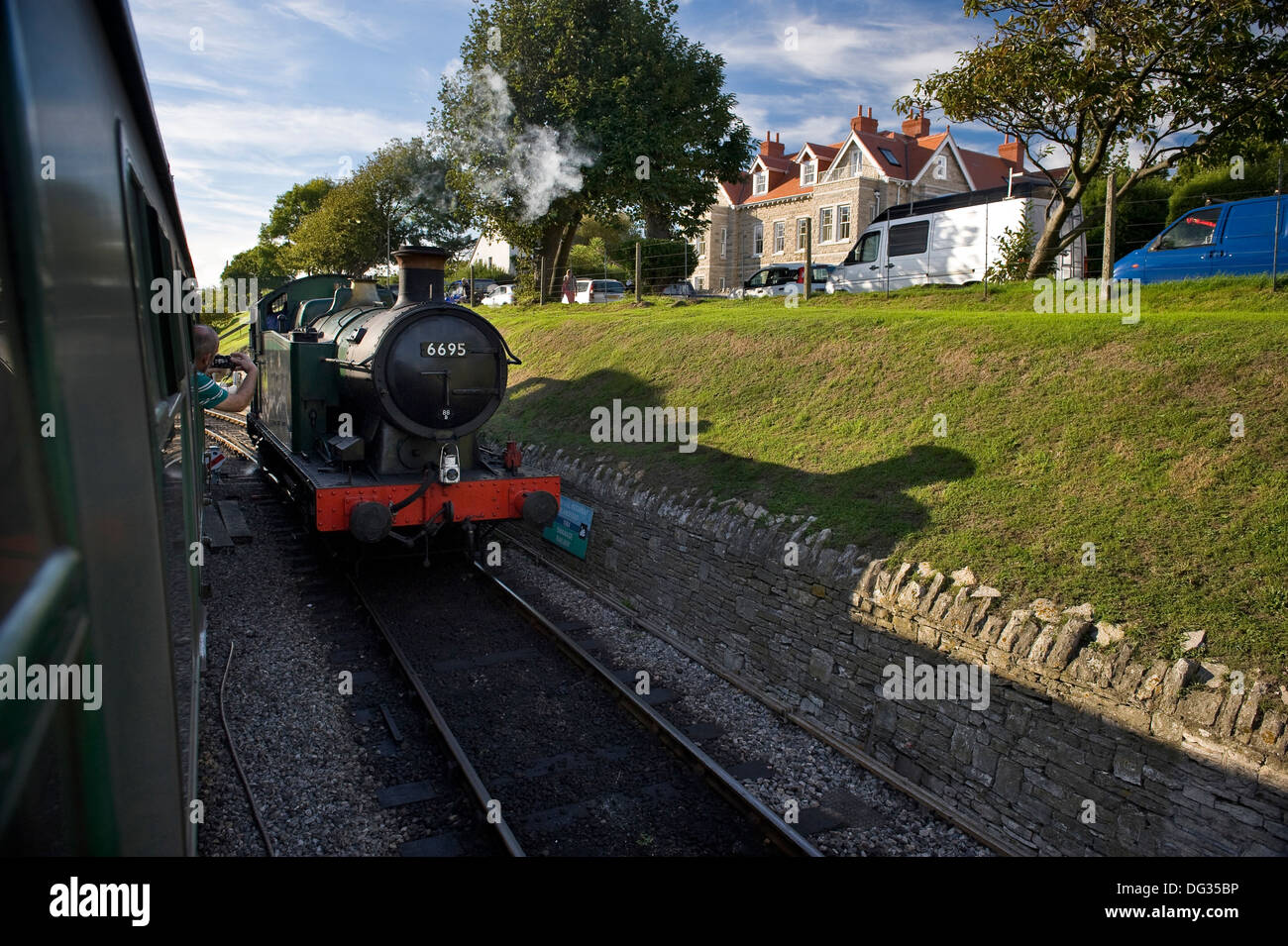A steam locomotive on the Swanage Railway about to depart Swanage ...