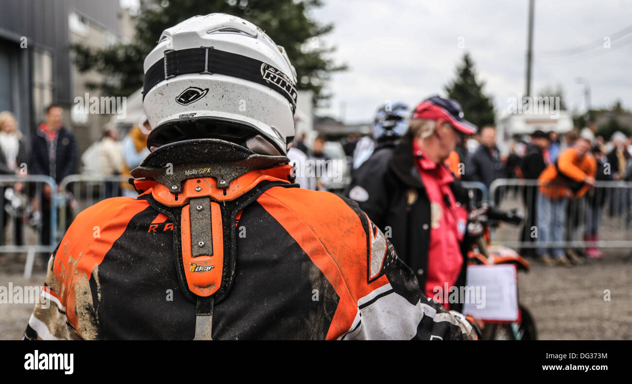 Supermoto rider waiting for the race on the start line. Focused on the ...
