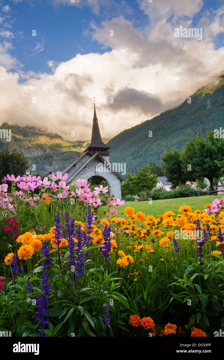 Catholic Church in Chamonix France with spectacular alps and clouds in ...