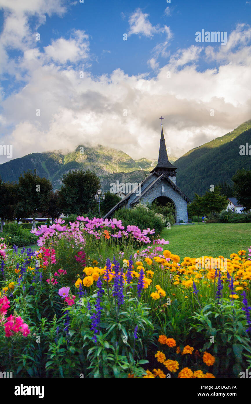 Catholic Church in Chamonix France with spectacular alps and clouds in ...