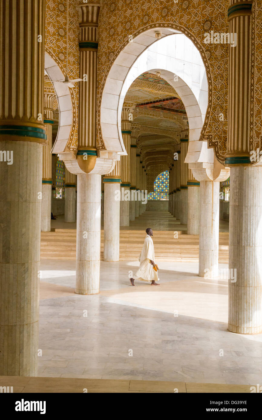 Senegal, Touba. Worshipper Carrying Shoes Walking through Prayer Halls ...