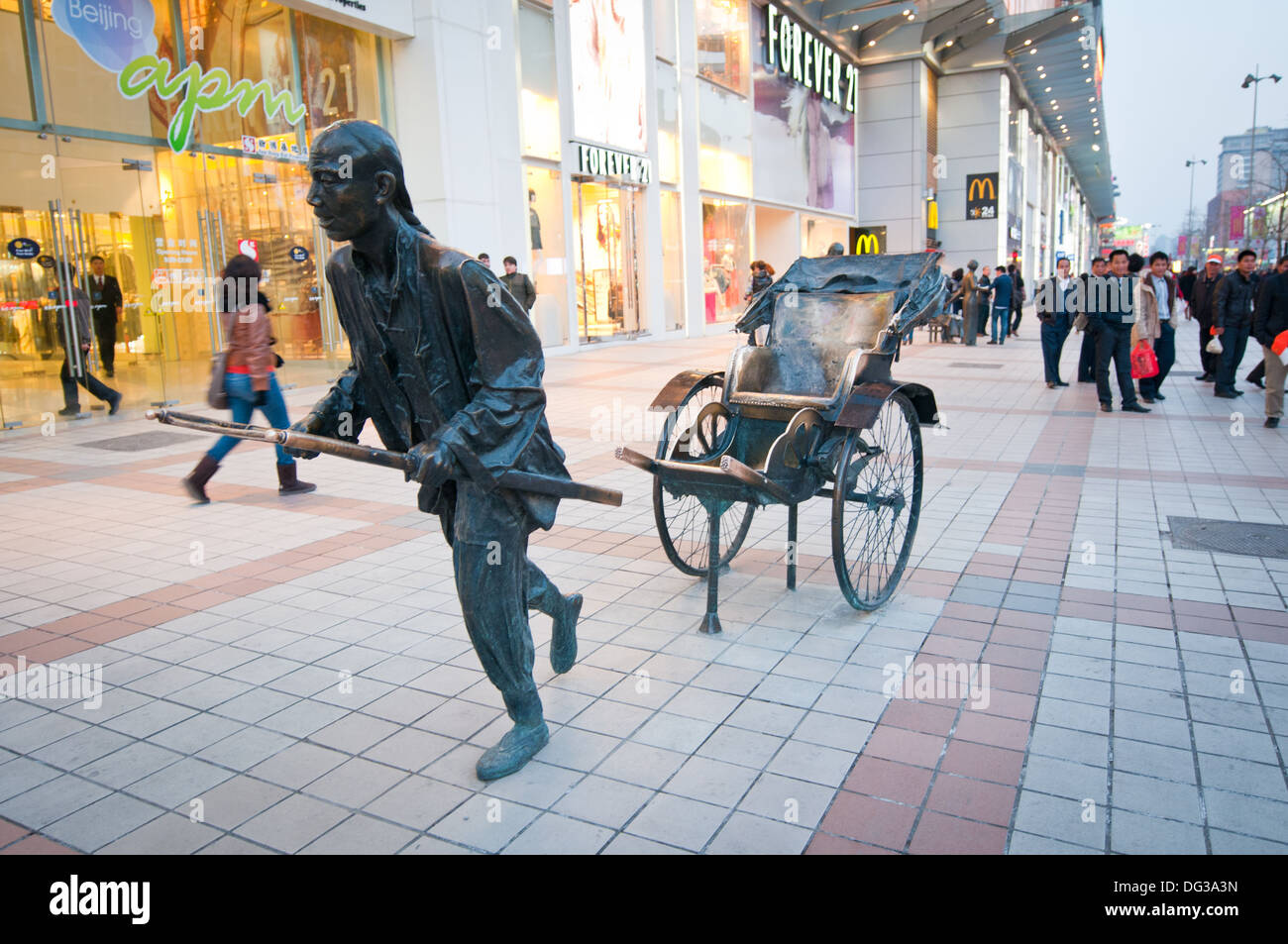 depicting figures of Chinese rickshaw man at Wangfujing pedestrian ...