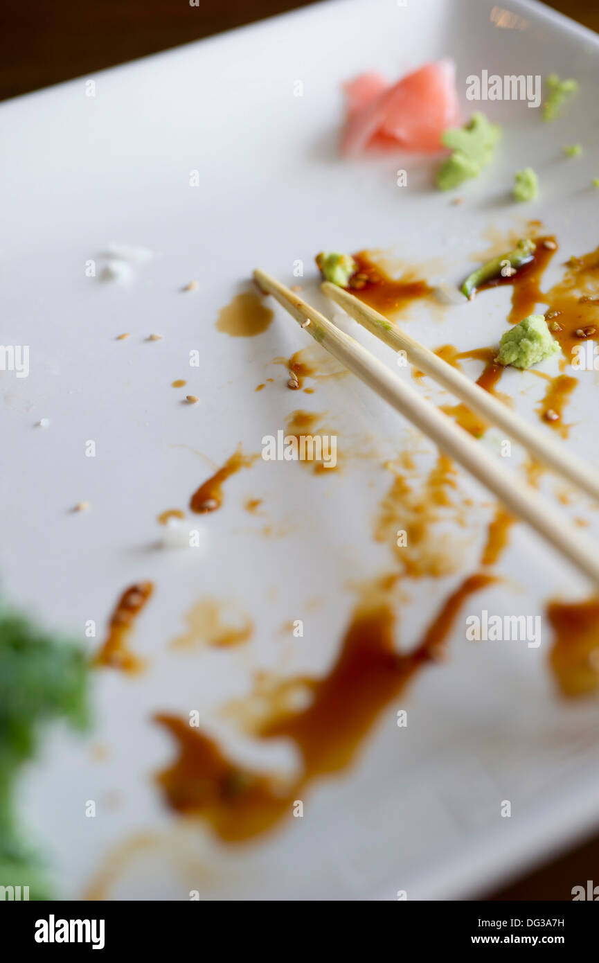 Scraps of Japanese Food Chopsticks on Empty Plate Stock Photo - Alamy