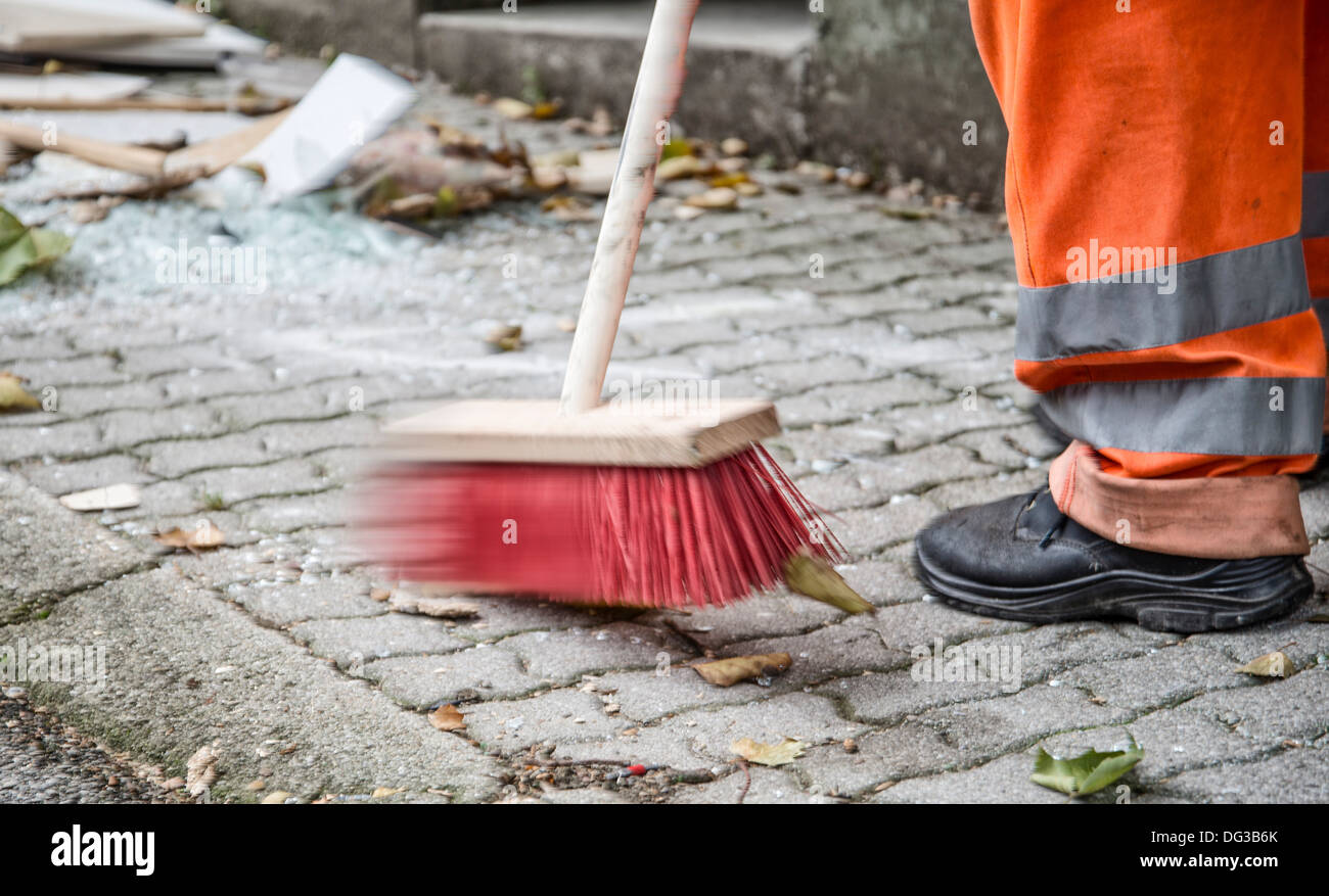 sanitation worker is cleaning the street Stock Photo - Alamy