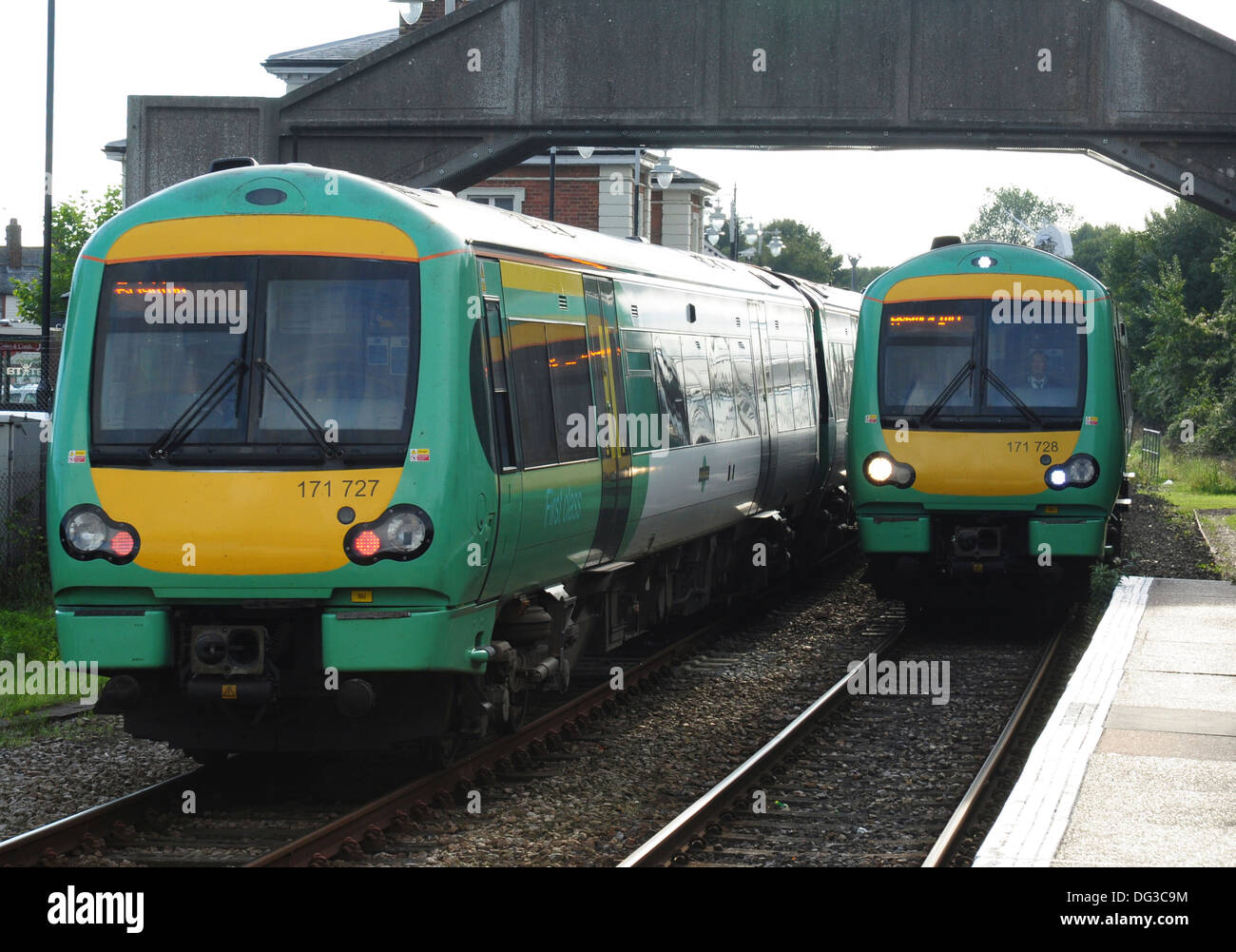 Class 171 Turbostar DMUs Nos 171727 and 171728 passing at the railway ...