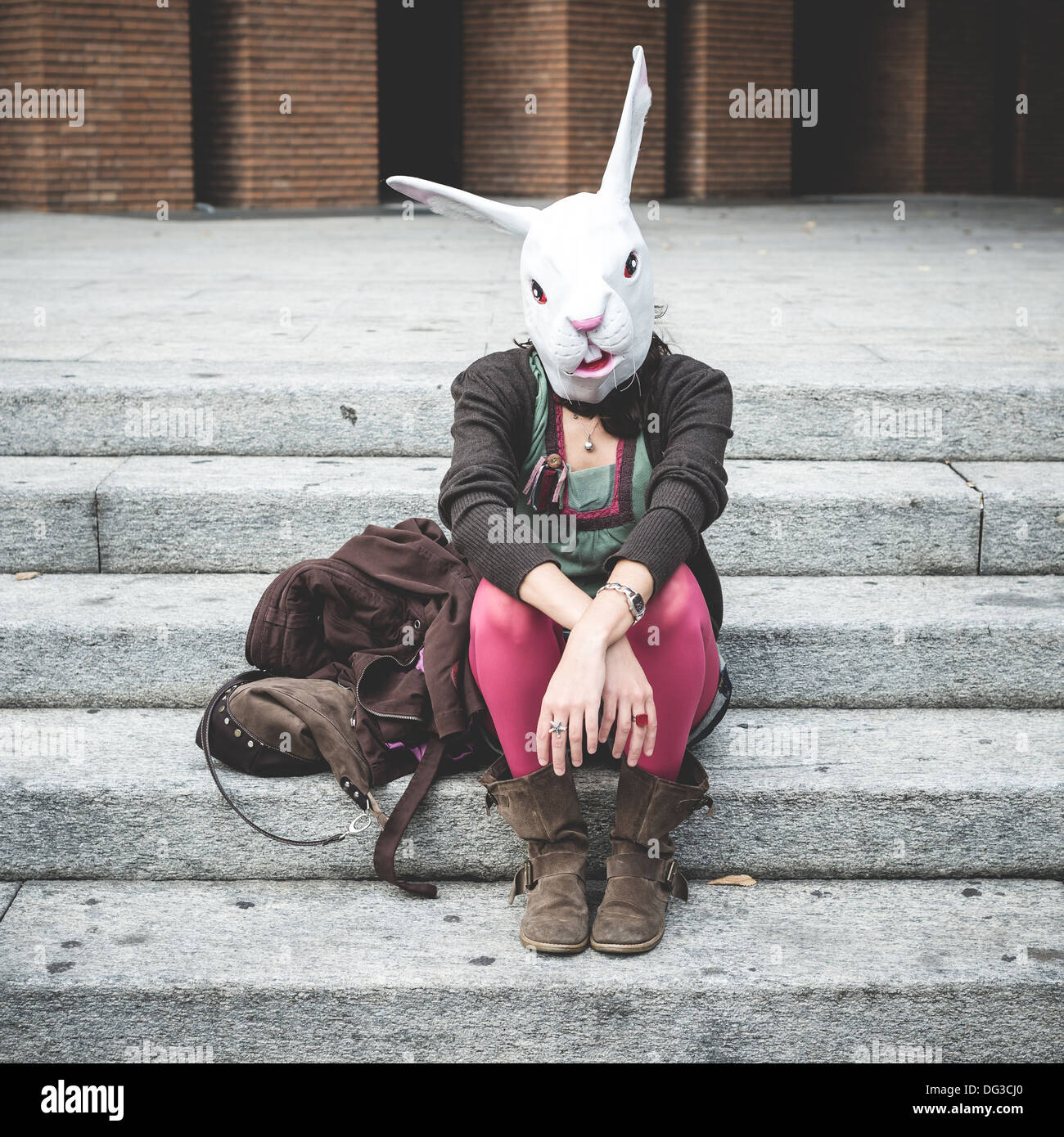rabbit head woman in the city Stock Photo - Alamy