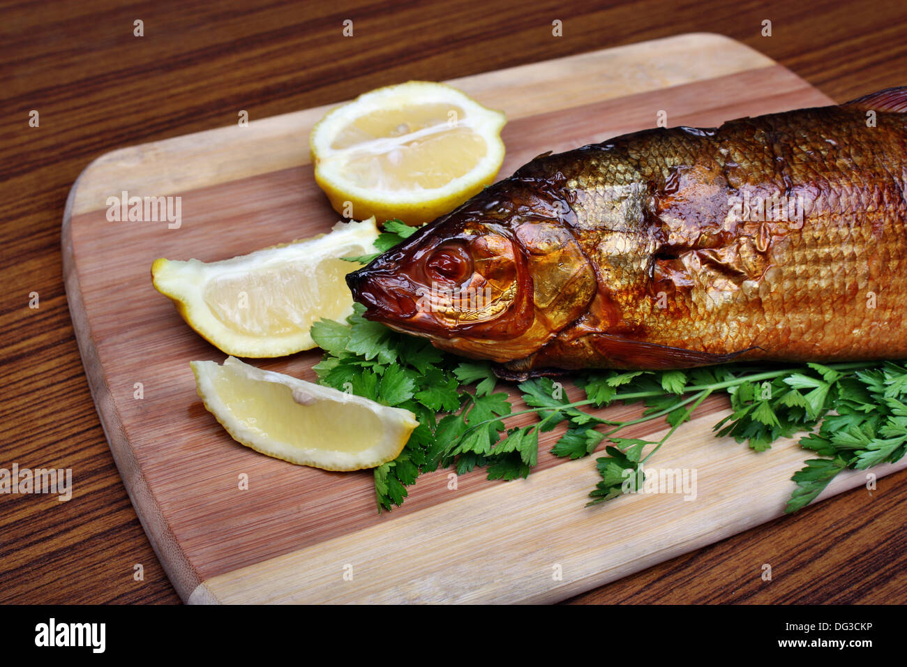 Fish smoked whitefish on a chopping board Stock Photo - Alamy