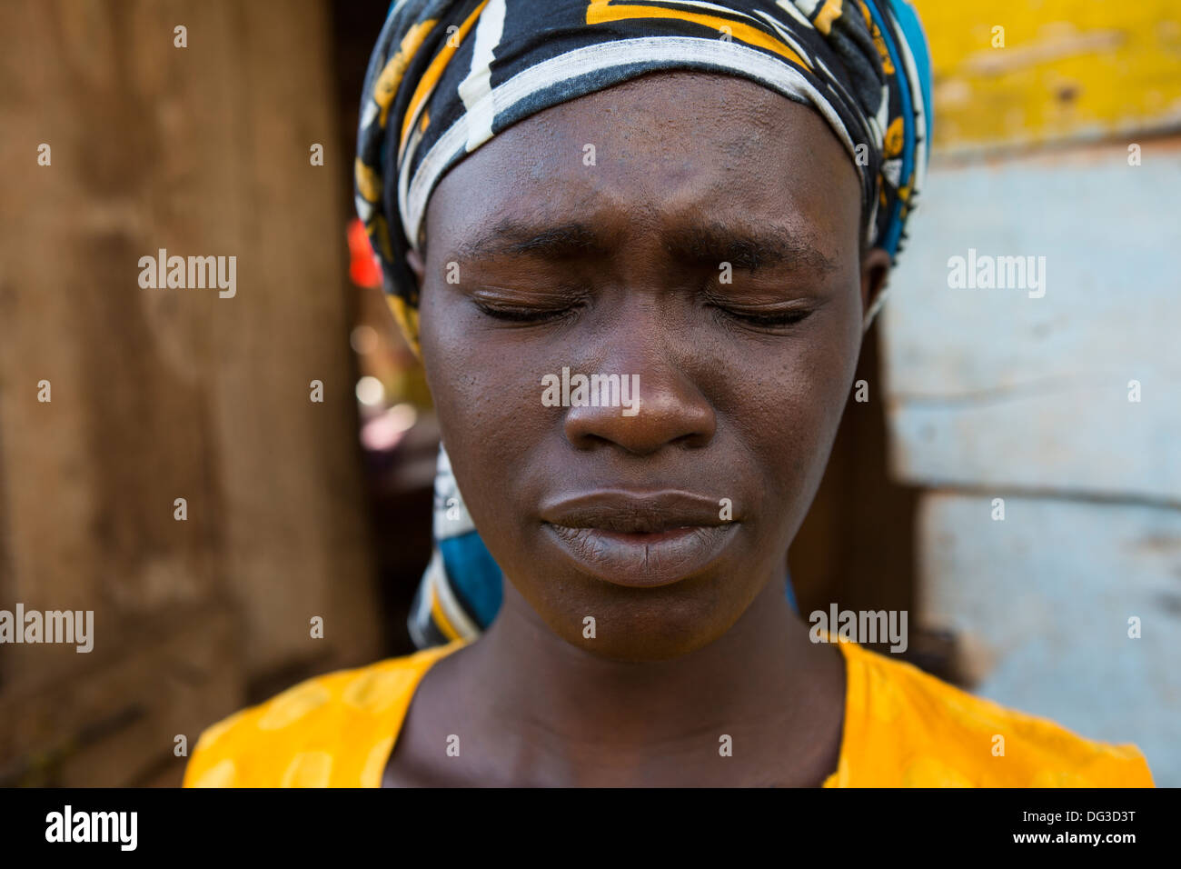 A young, sad, African girl in Kampala, Uganda Stock Photo - Alamy