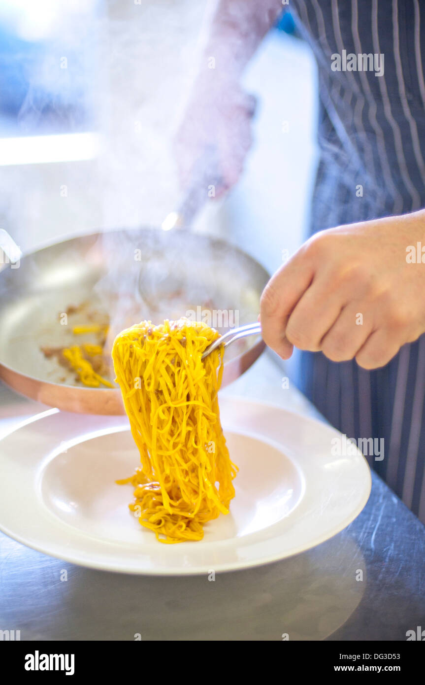 Chef Plating Taglierini Pasta, Close Up Stock Photo - Alamy
