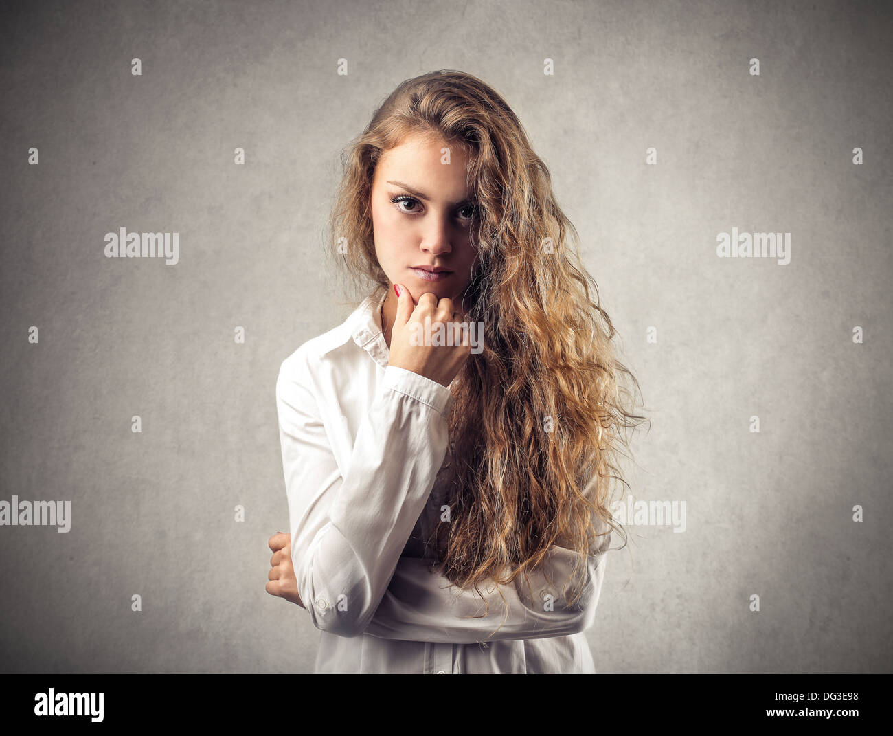 Beautiful blonde girl angry Stock Photo - Alamy