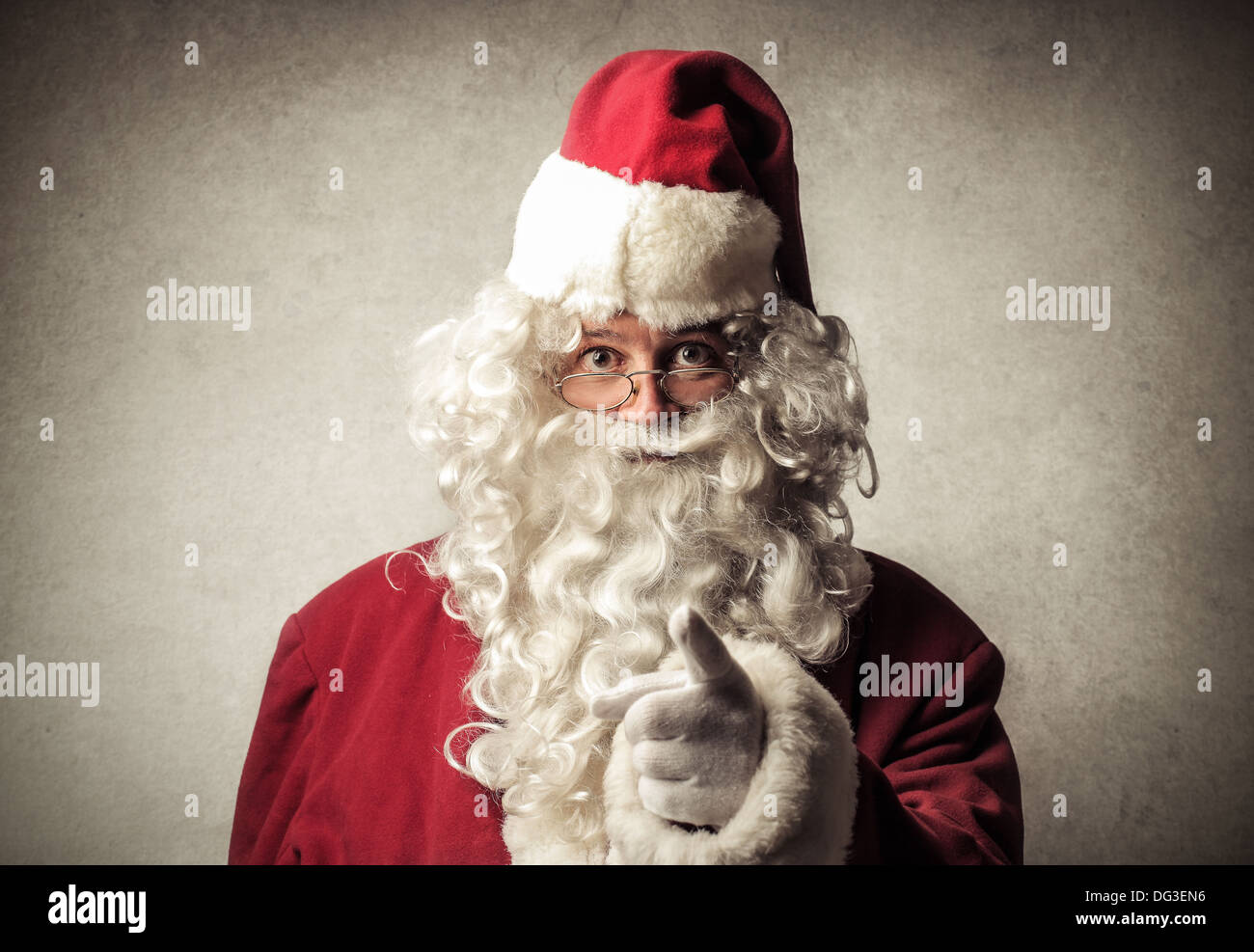 Portrait of Santa Claus indicating someone Stock Photo - Alamy
