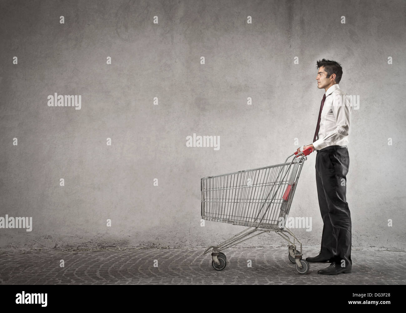 Office worker carrying a shopping cart Stock Photo - Alamy