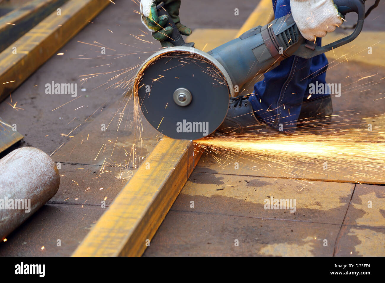 worker cuts metal profile using the hand tool Stock Photo - Alamy