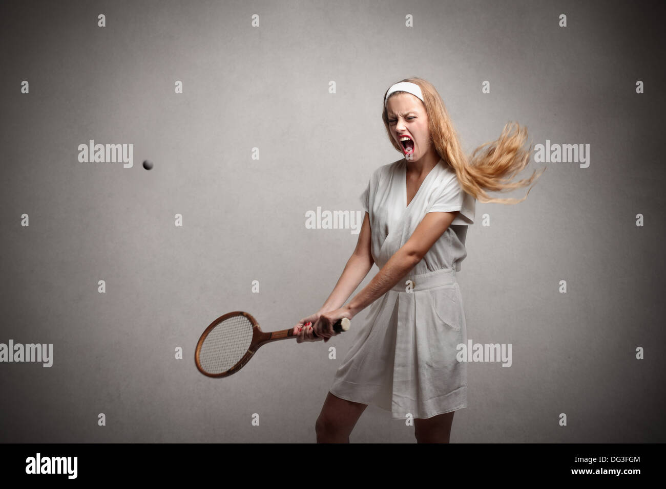 Blonde girl playing squash Stock Photo - Alamy