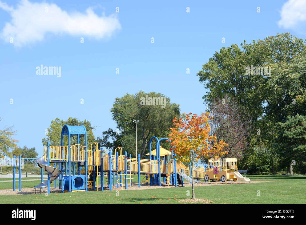 child playground with blue sky and clouds Stock Photo - Alamy