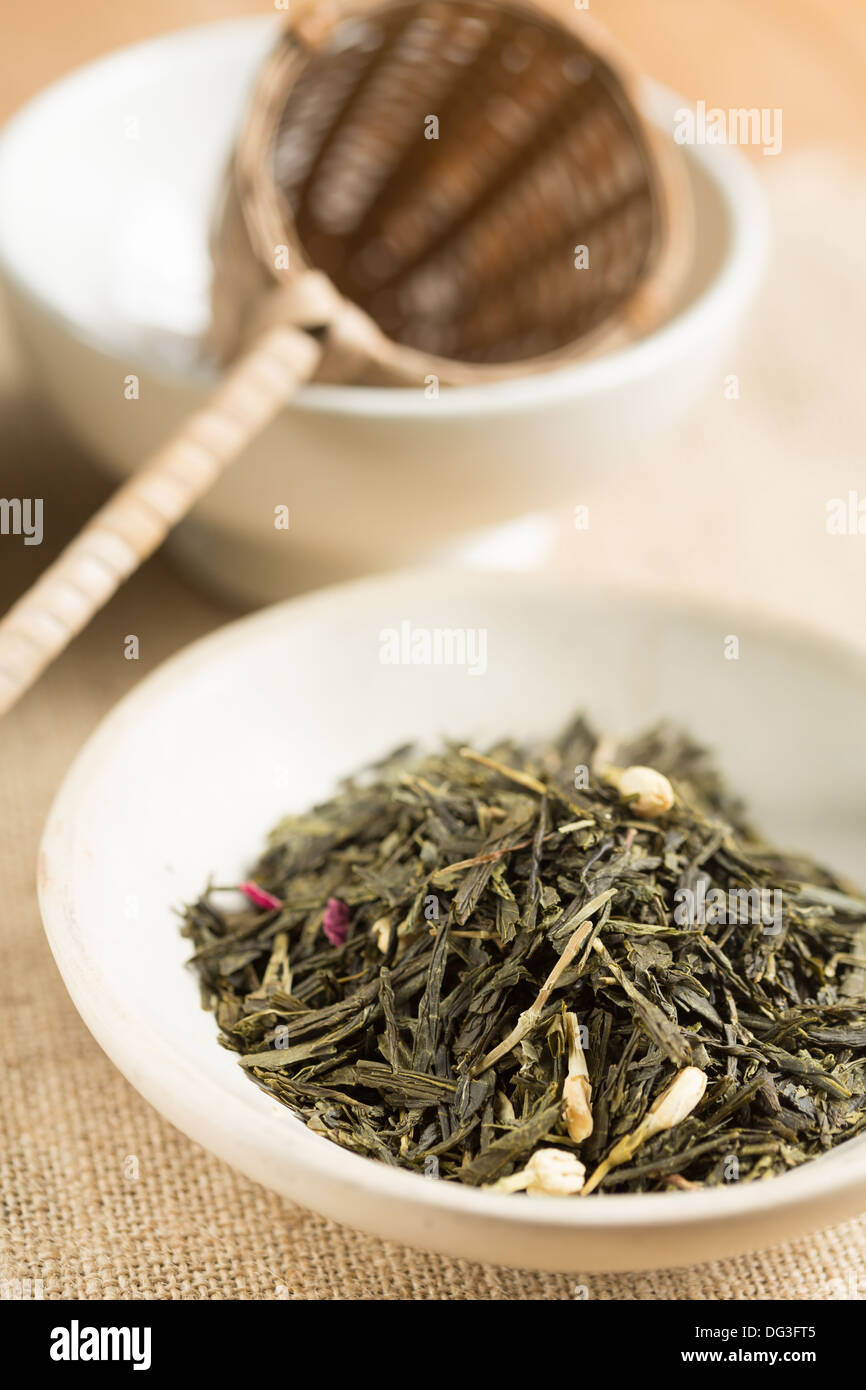 Green tea leaves with dried flowers Stock Photo - Alamy