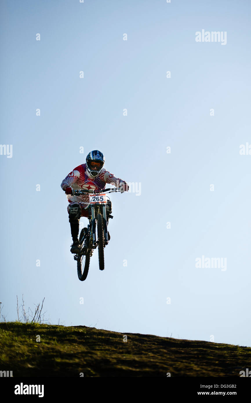 Jumping downhill Biking Stock Photo - Alamy