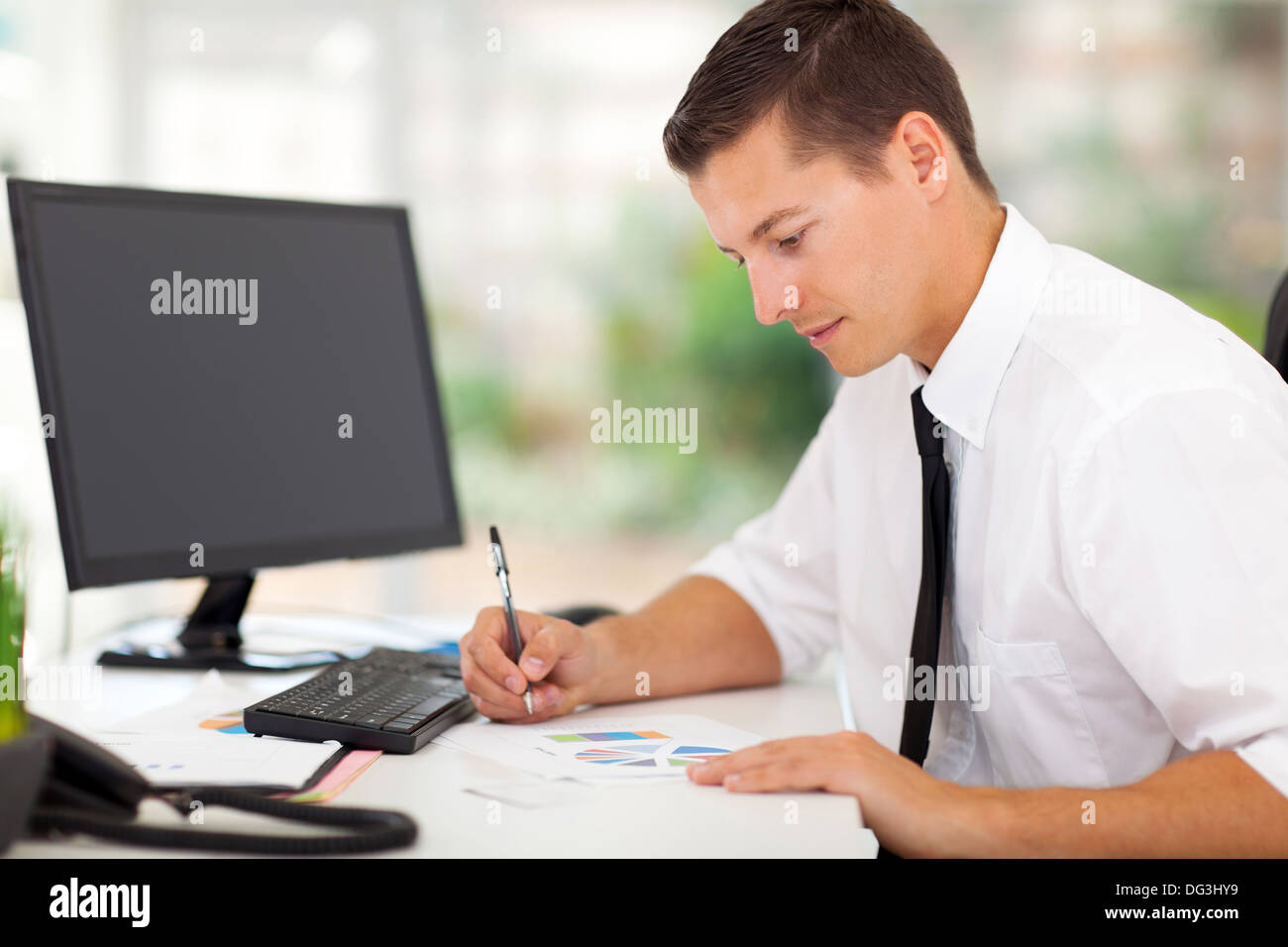 Busy male businessman papers in hi-res stock photography and images - Alamy