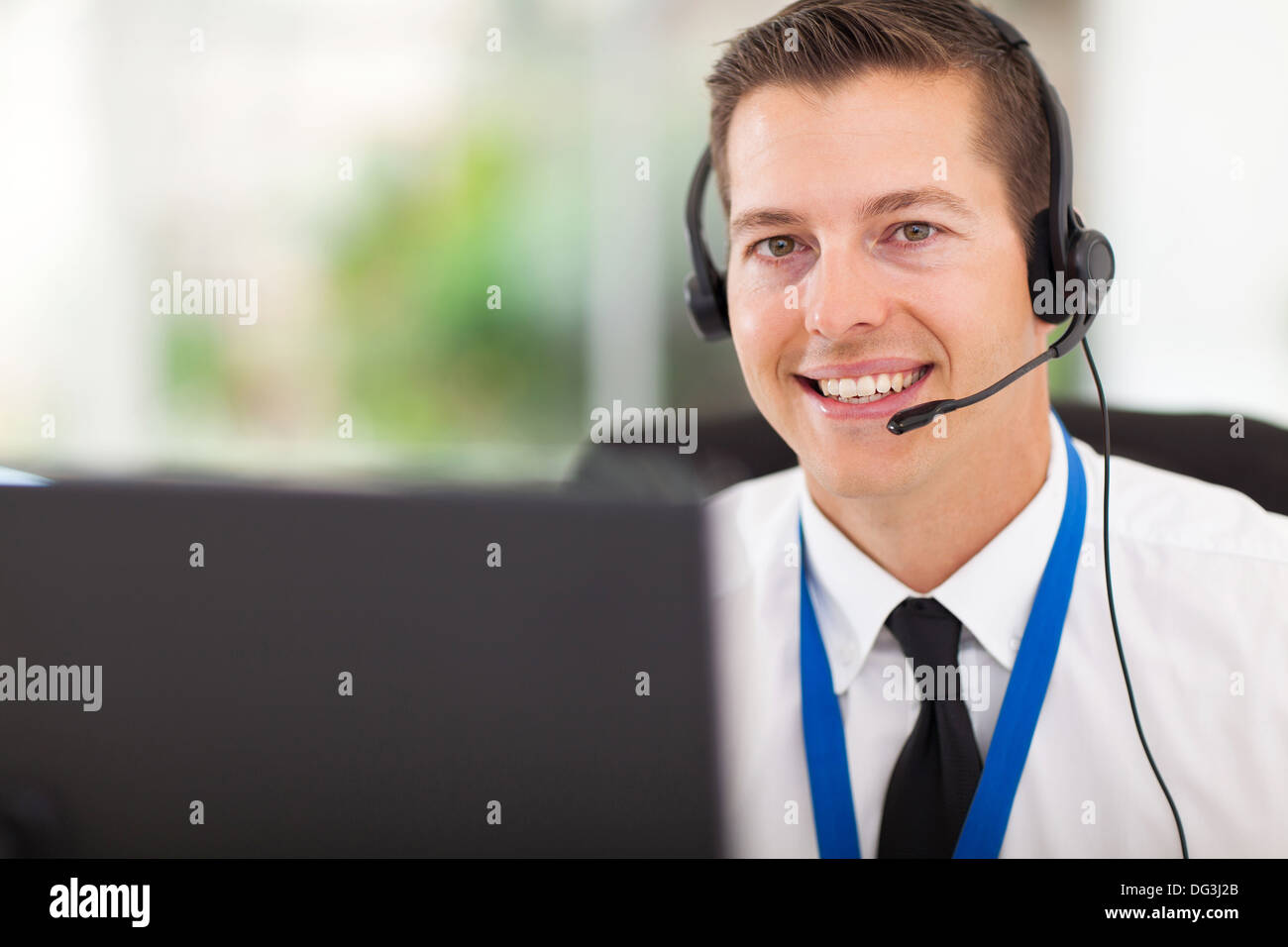 Business customer support guy smiling hi-res stock photography and ...