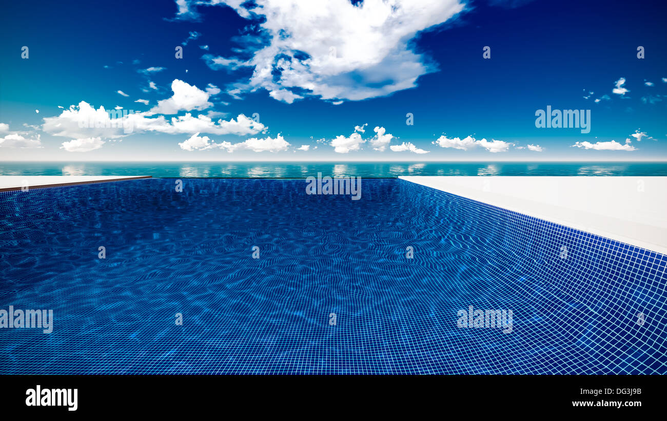Infinite swimming pool with ocean in background Stock Photo - Alamy