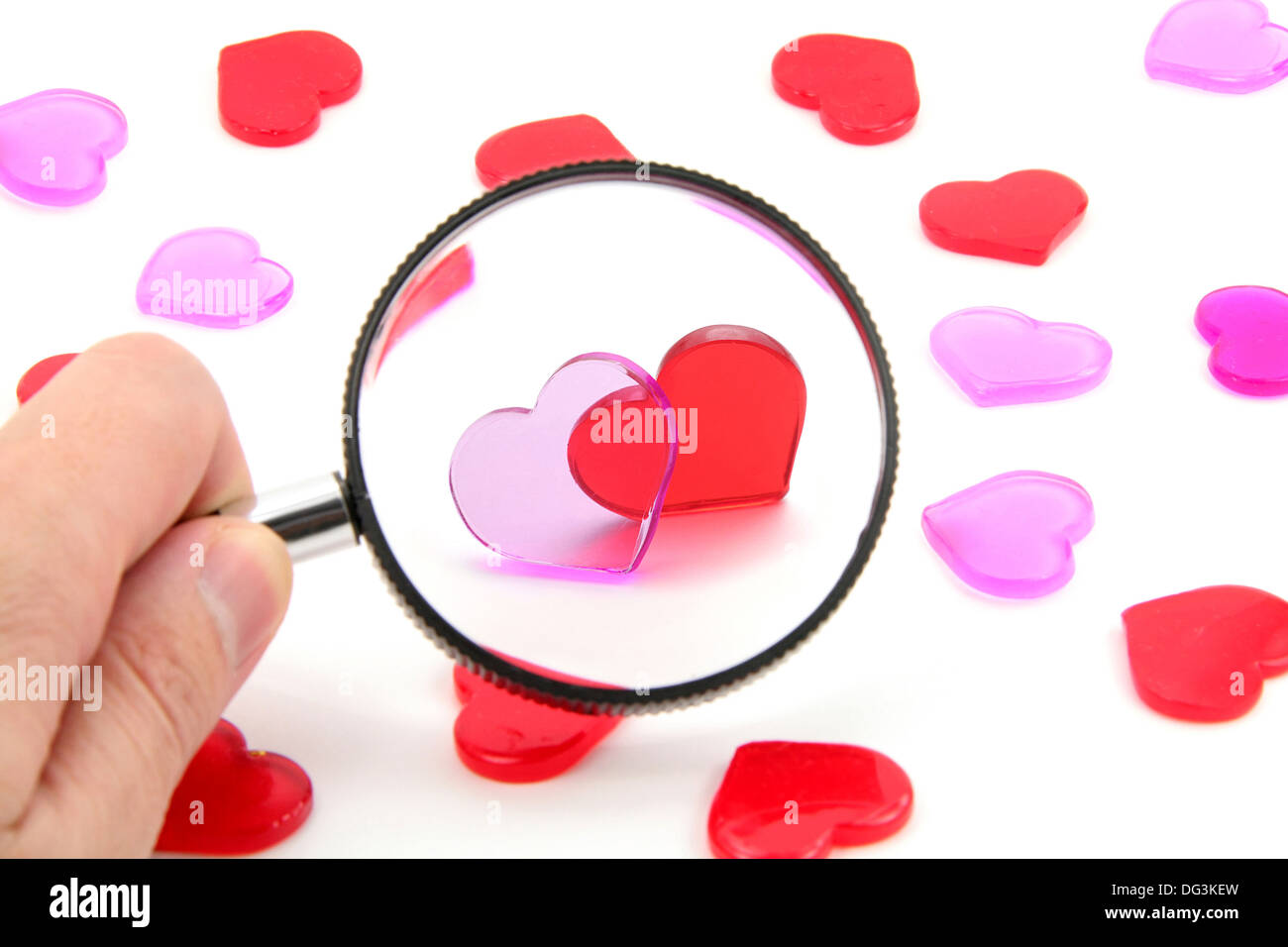 red heart and magnifier, love concept, with white background Stock ...