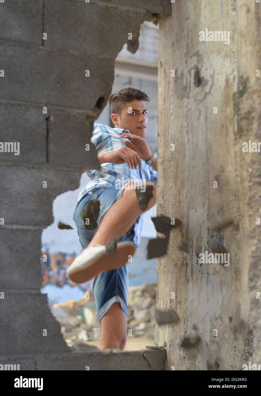 Breaking Through Brick Wall High Resolution Stock Photography and ...