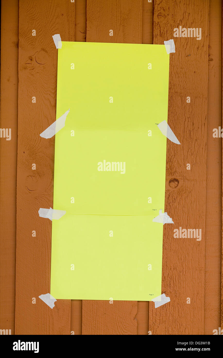 blank yellow paper stick on outside wall Stock Photo - Alamy