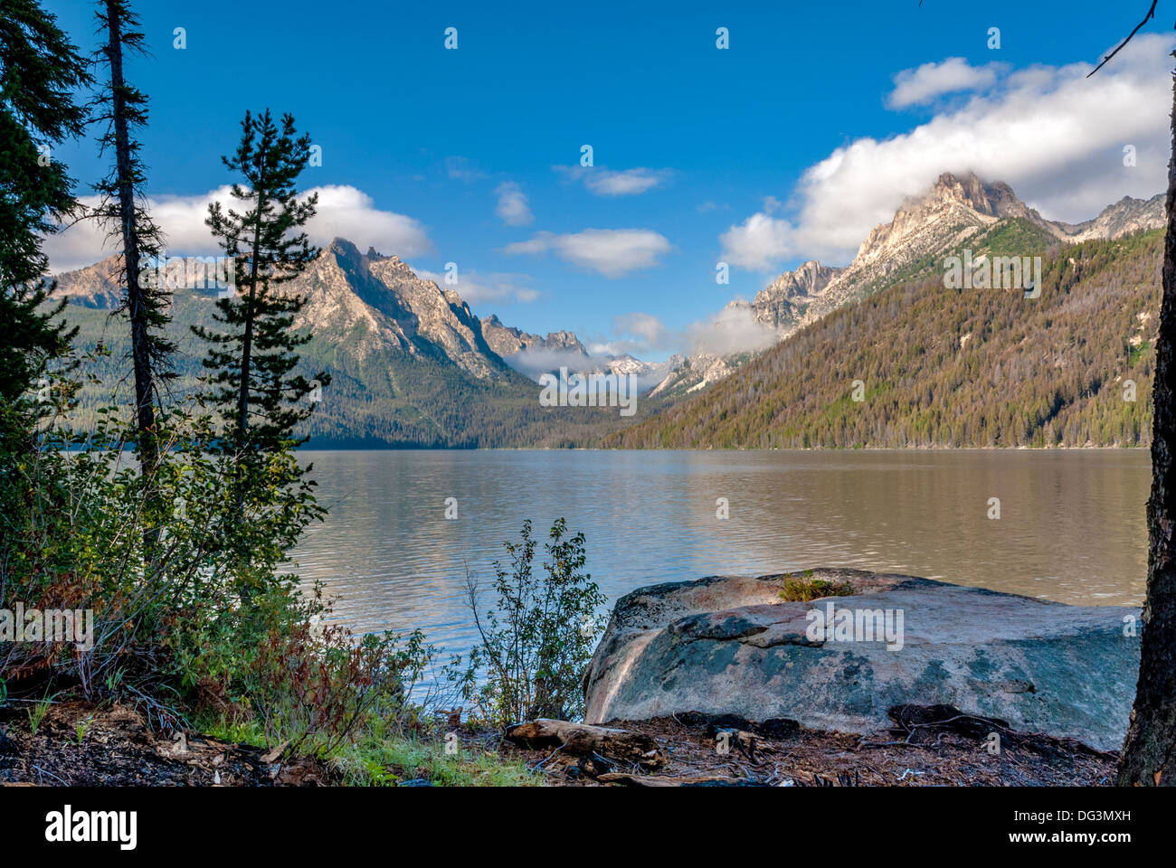 Beautiful mountain scene with a lake and clouds Stock Photo - Alamy