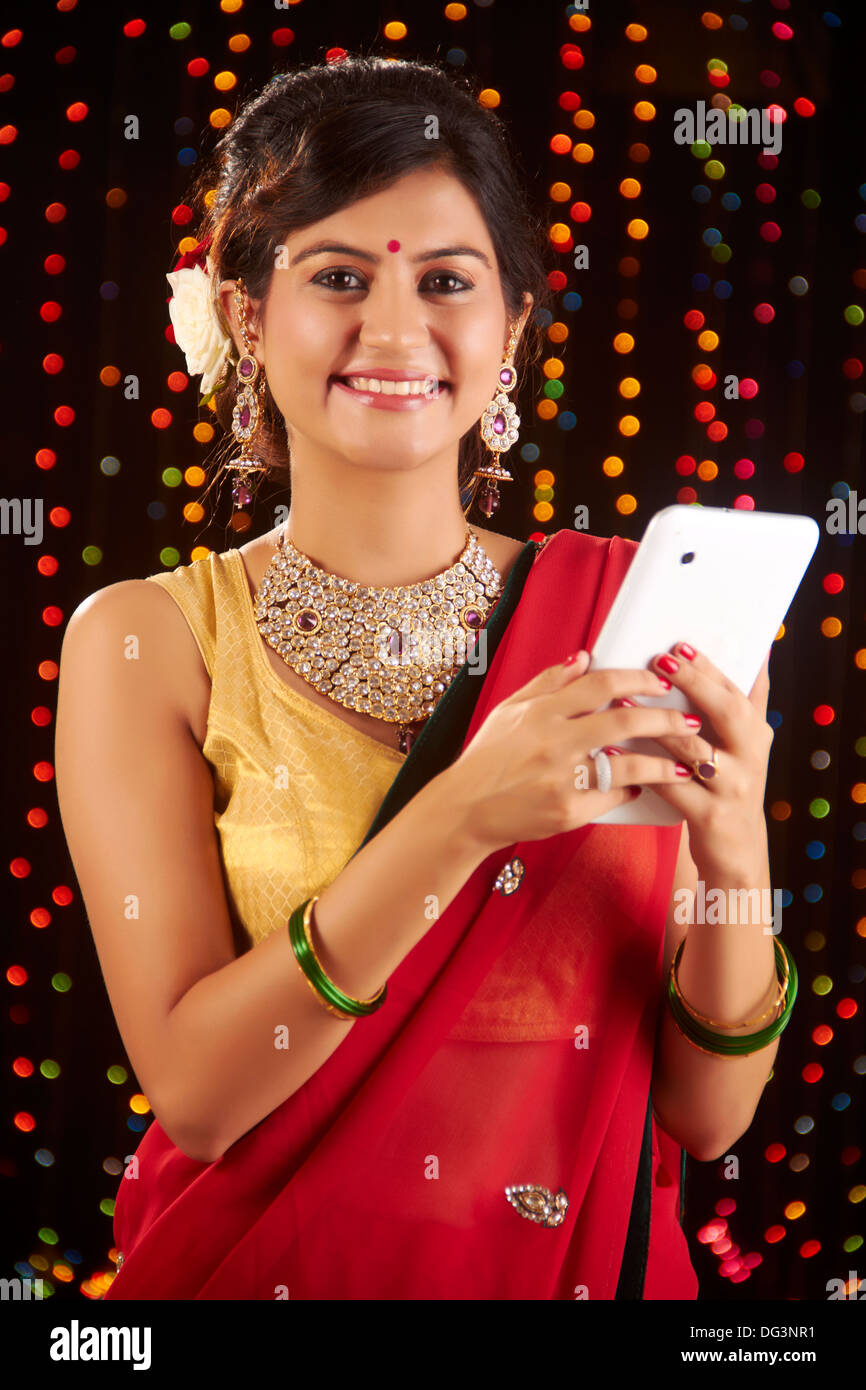 Indian Woman with mobile phone Diwali Festival Stock Photo - Alamy