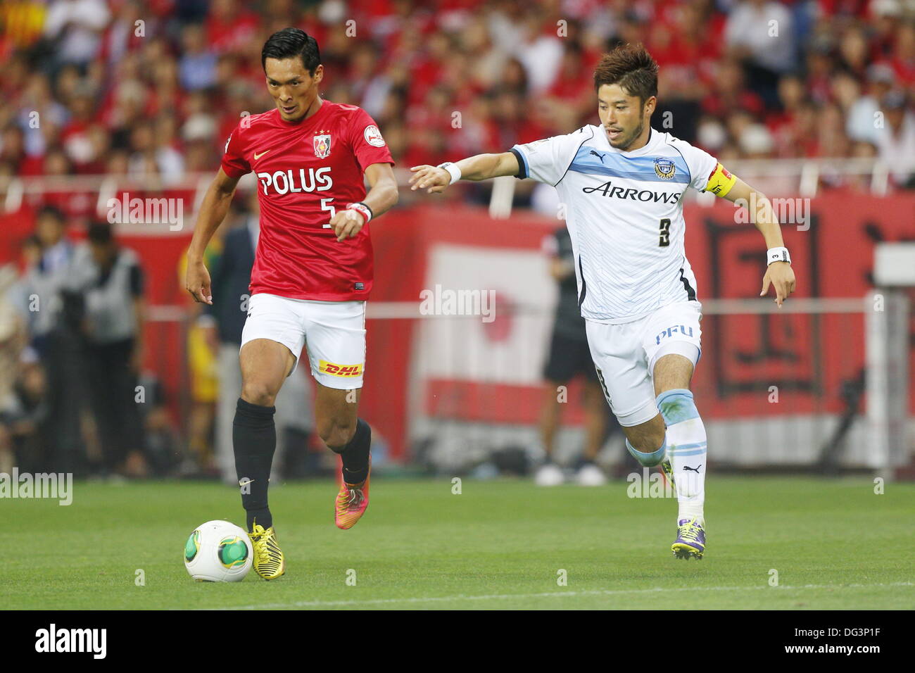 Saitama Stadium 2002, Saitama, Japan. 12th Oct, 2013. (L-R) Tomoaki ...