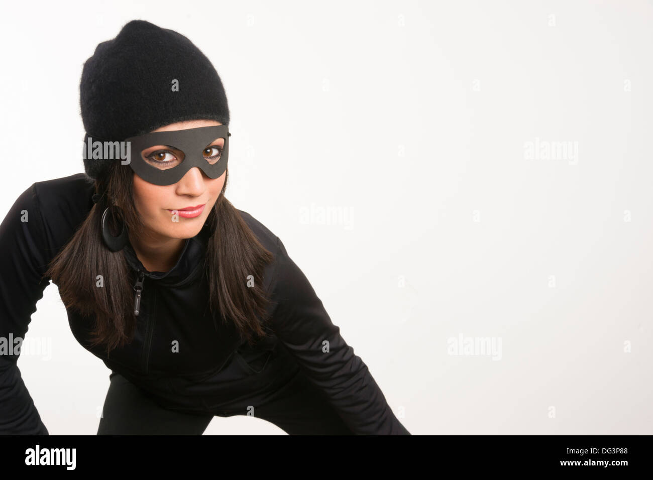 Female thief in black mask hi-res stock photography and images - Alamy