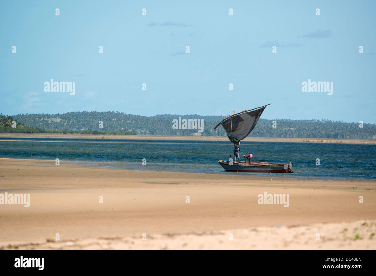 Fishermen with dhow setting seine net, Flamingo Bay, Inhambane ...